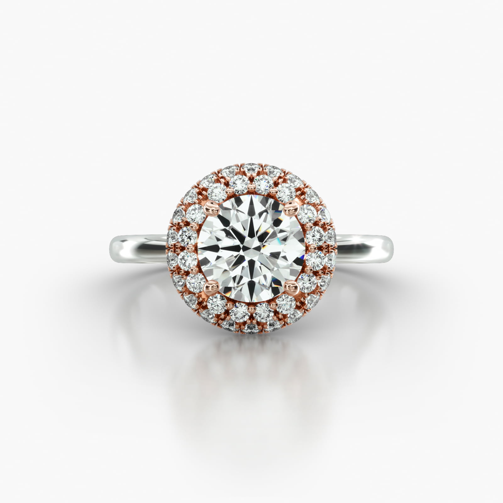 Solitaire Engagement Ring Embellished With a Falling Edge Pavé Halo ...
